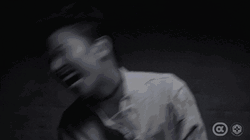Straight Jacket Screaming Man GIF | GIFDB.com