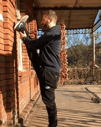 Stretching Leg Funny GIF | GIFDB.com