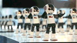 Stretching Robi Dancing Robots GIF | GIFDB.com