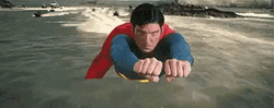 Superman Flying With Clenched Fist GIF | GIFDB.com
