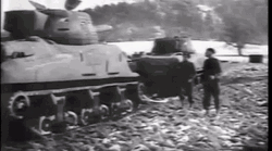 Tank Capsized By Two Men GIF | GIFDB.com
