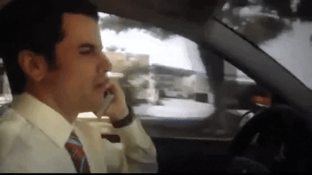 Taparse La Cara An Uber Driver Calling While Driving GIF | GIFDB.com