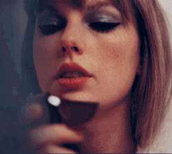 Taylor Swift Igniting Lighter GIF | GIFDB.com
