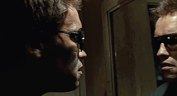 Terminator Arnold Schwarzenegger Mirror Reflection GIF | GIFDB.com