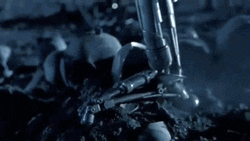 Terminator Skynet Holding A Gun GIF | GIFDB.com