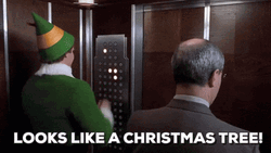 The Elf Buddy Hobbs Pushing Elevator Buttons GIF | GIFDB.com