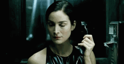 The Matrix Trinity Making Phone Call GIF | GIFDB.com