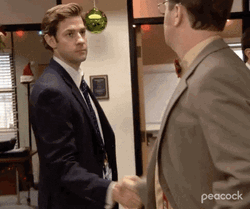 The Office Christmas Aggressive Handshake GIF | GIFDB.com