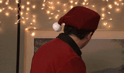 The Office Christmas Santa Bond GIF | GIFDB.com