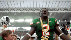 The U Trajan Bandy Raising Hands GIF | GIFDB.com