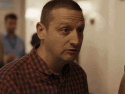 Tim Robinson Silly Face Shushing GIF | GIFDB.com