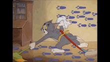 Tom Cat Cleaning The Floor GIF | GIFDB.com