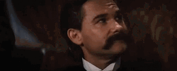 Tombstone Johnny Ringo Playing GIF | GIFDB.com