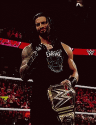 Tribal Chief Roman Reigns Making Get Out Hand Sign GIF | GIFDB.com