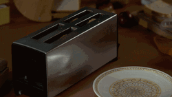 Waffles Popping Up In Toaster GIF | GIFDB.com