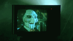 Watching Saw Movie In The Television GIF | GIFDB.com
