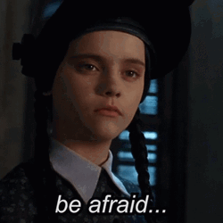 Wednesday Addams Be Very Afraid Meme GIF | GIFDB.com