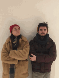 Were Waiting Man And Woman Leaning Against Wall GIF | GIFDB.com