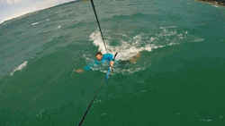 Windsurfing Man Swims GIF | GIFDB.com