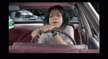 Woman Driving Fast Car In Rocky Road Funny GIF | GIFDB.com