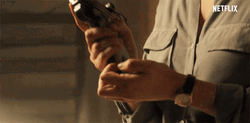 Woman Loading Gun GIF | GIFDB.com