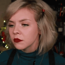 Woman Shows Unamused Face GIF | GIFDB.com