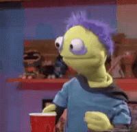 Yellow Puppet Dancing GIF | GIFDB.com