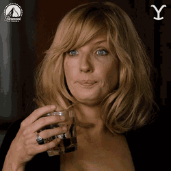 Yellowstone Beth Dutton I Don't Know Shrug Drinking GIF | GIFDB.com